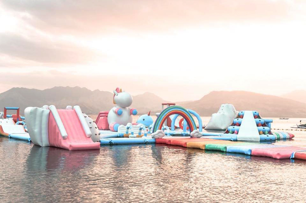 This Unicorn-Themed Floating Bouncy 'Island' Is Perfect For Your Inner Child